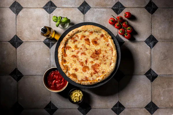 Pizza op het menu: 'Alsof het met de hand gemaakt is'